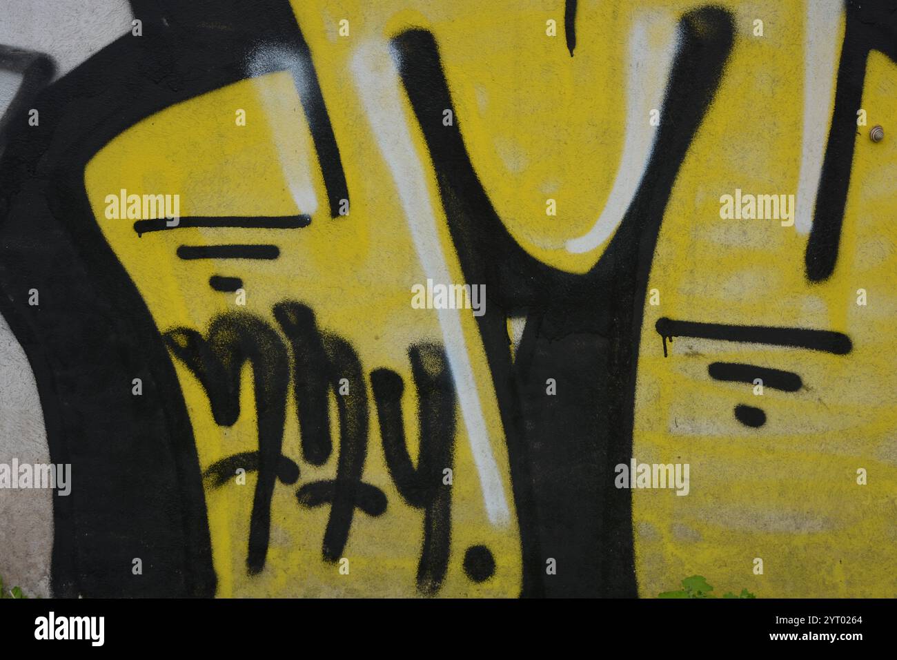 A drawing, graffiti depicting the word MOSE, is painted on a white-gray ...