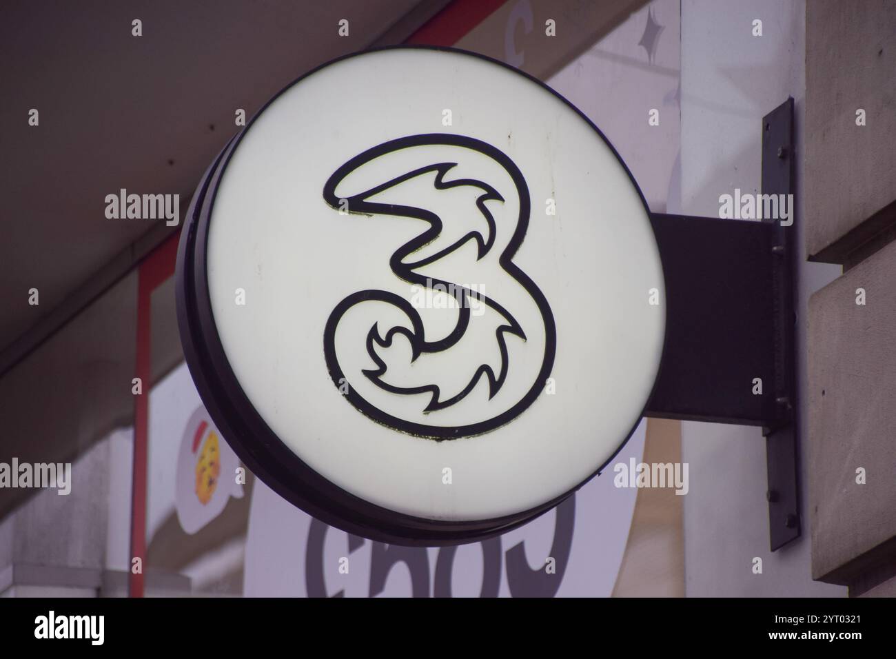London, UK. 5th December 2024. Logo at the Three mobile phone store in ...