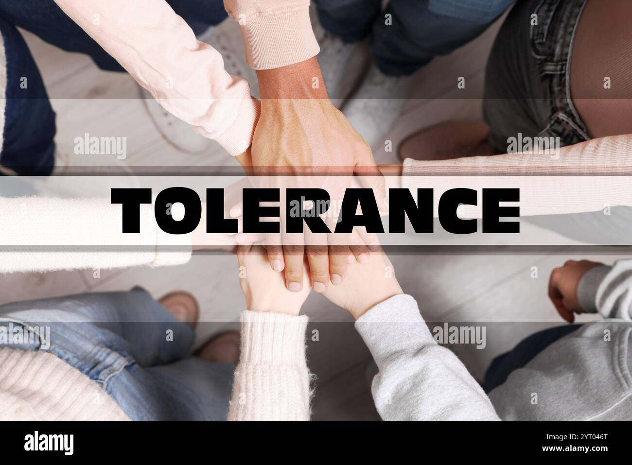 Tolerance concept. Group of multiracial people joining hands together ...