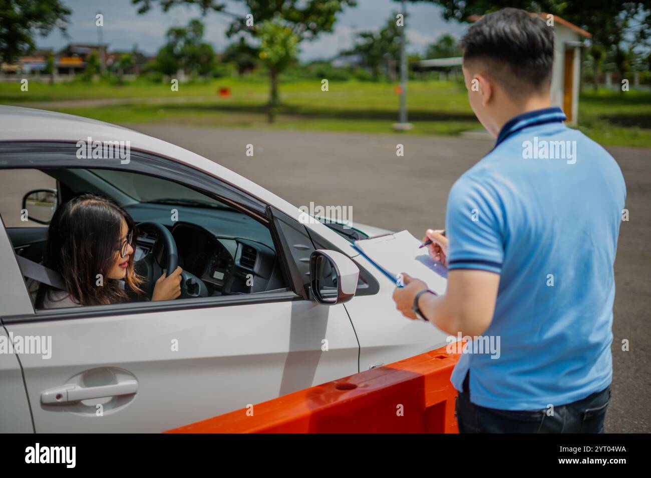 The driving assessment is in progress, evaluating new driver ...