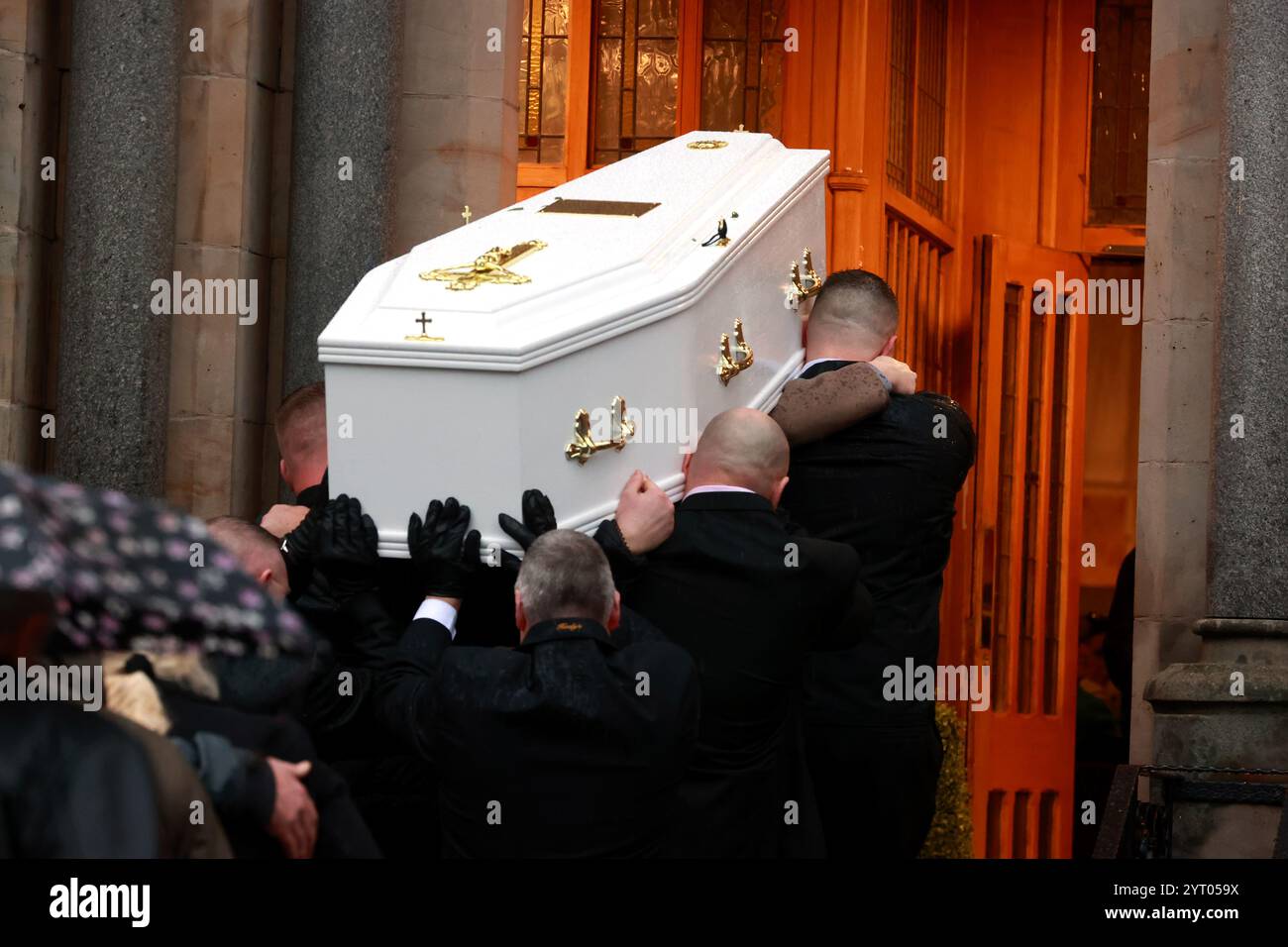 The coffin of Chloe Ferris is into St Paul's Church in Belfast for her ...