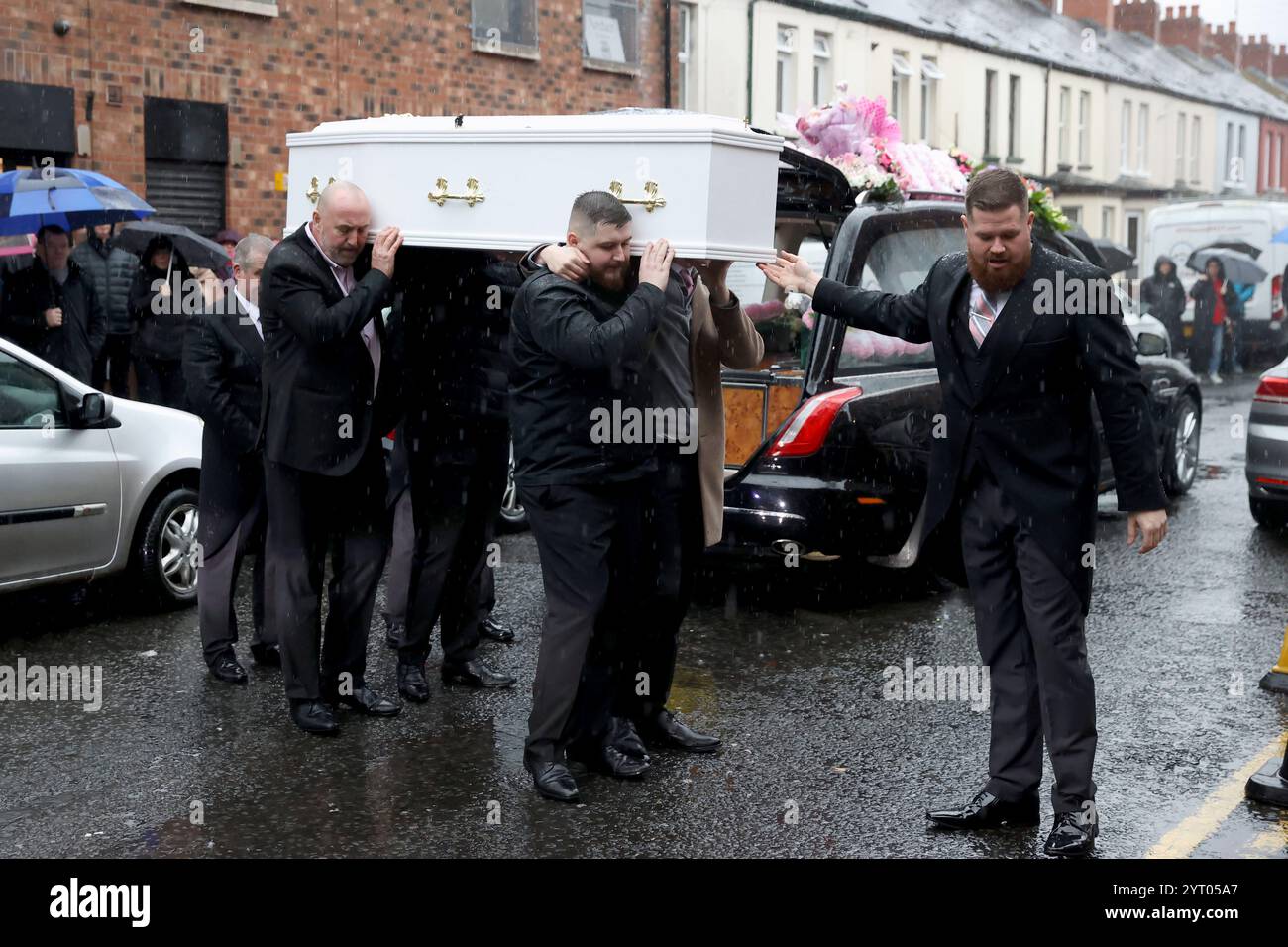 The coffin of Chloe Ferris is carried out of the hearse and into St ...