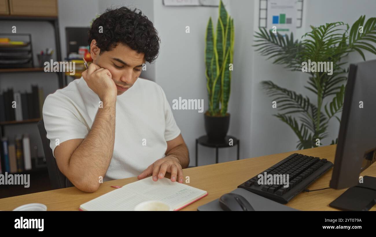 Young man reading book surrounded hi-res stock photography and images ...