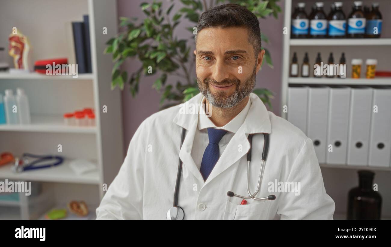 Doctor smiling in a clinic office with medical equipment and ...