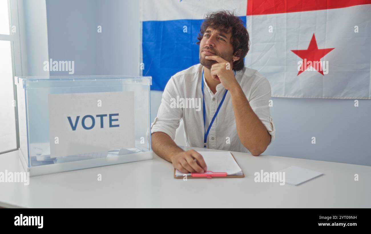 Young man thinking during election process in panama with a vote box ...