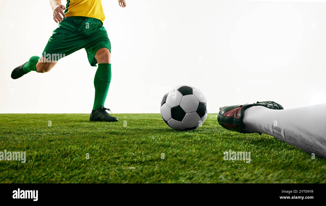 Single bombardier in green uniform running towards ball on field on ...