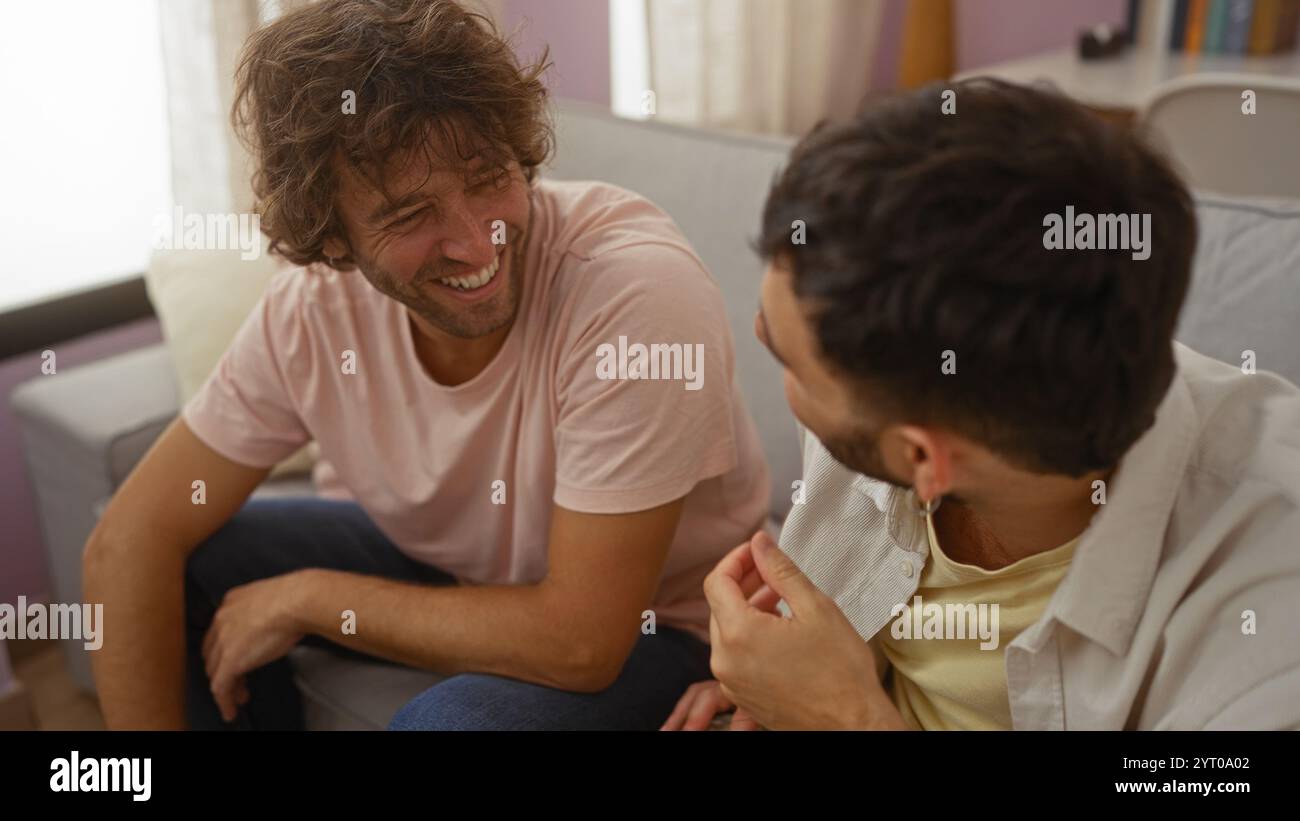 Two men chatting in the living room hi-res stock photography and images ...