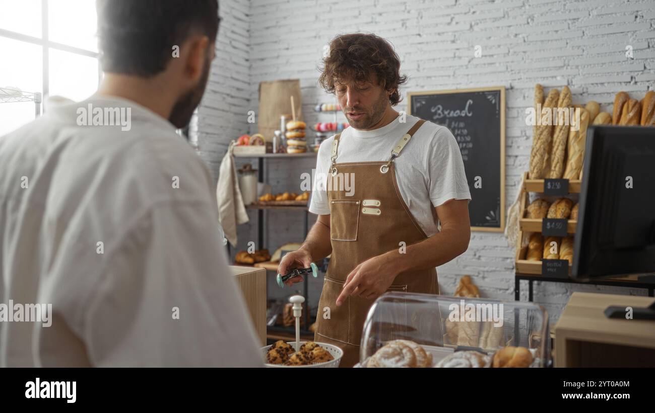 Baker helps customer in bakery showcasing variety of bread and pastries ...