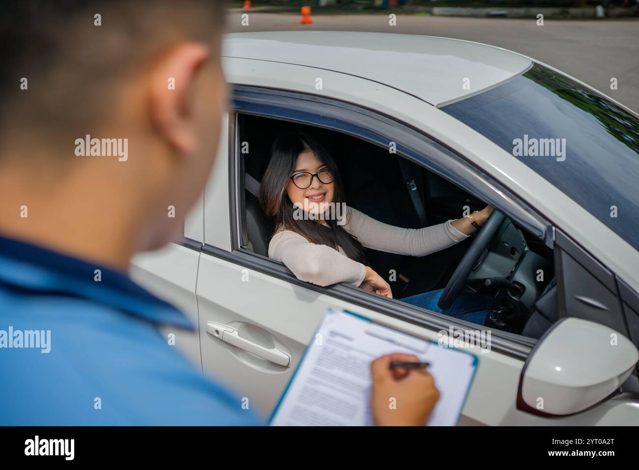 A Driving Test Assessment conducted between an Instructor and Student ...