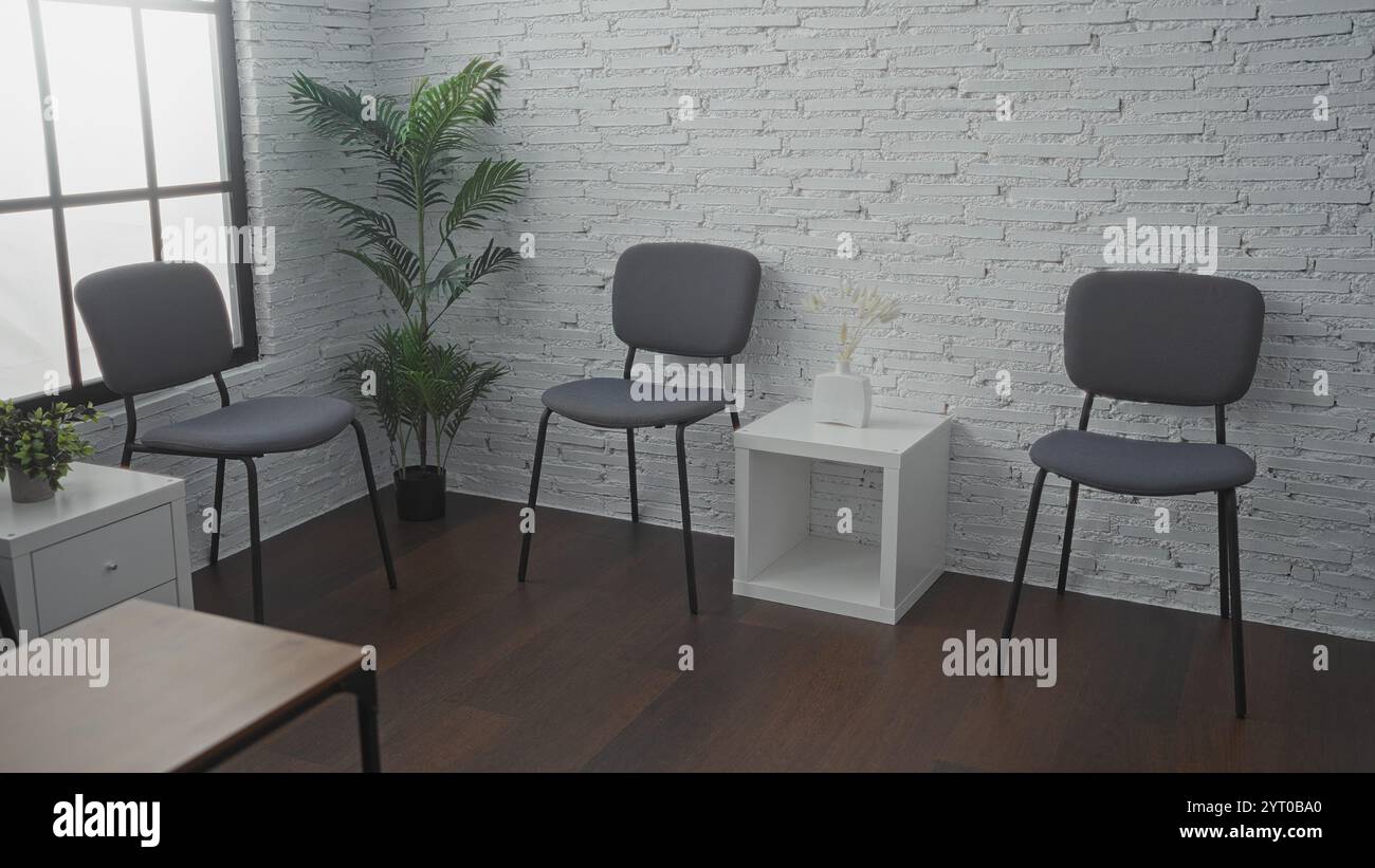 Empty clinic waiting room with gray chairs, a white brick wall, indoor ...
