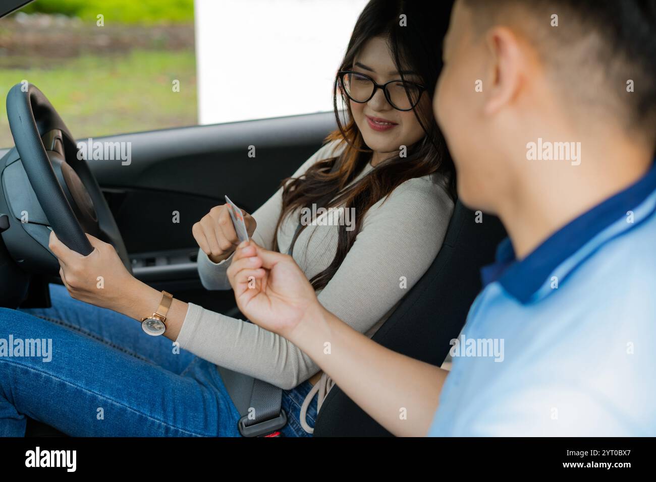 A couple shares meaningful moments together in a car during a relaxed ...