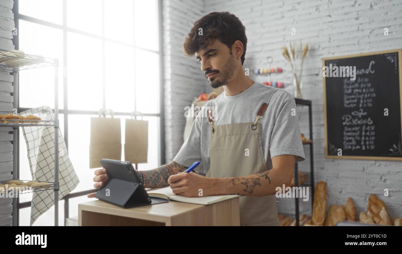 Handsome man in bakery using hi-res stock photography and images - Alamy