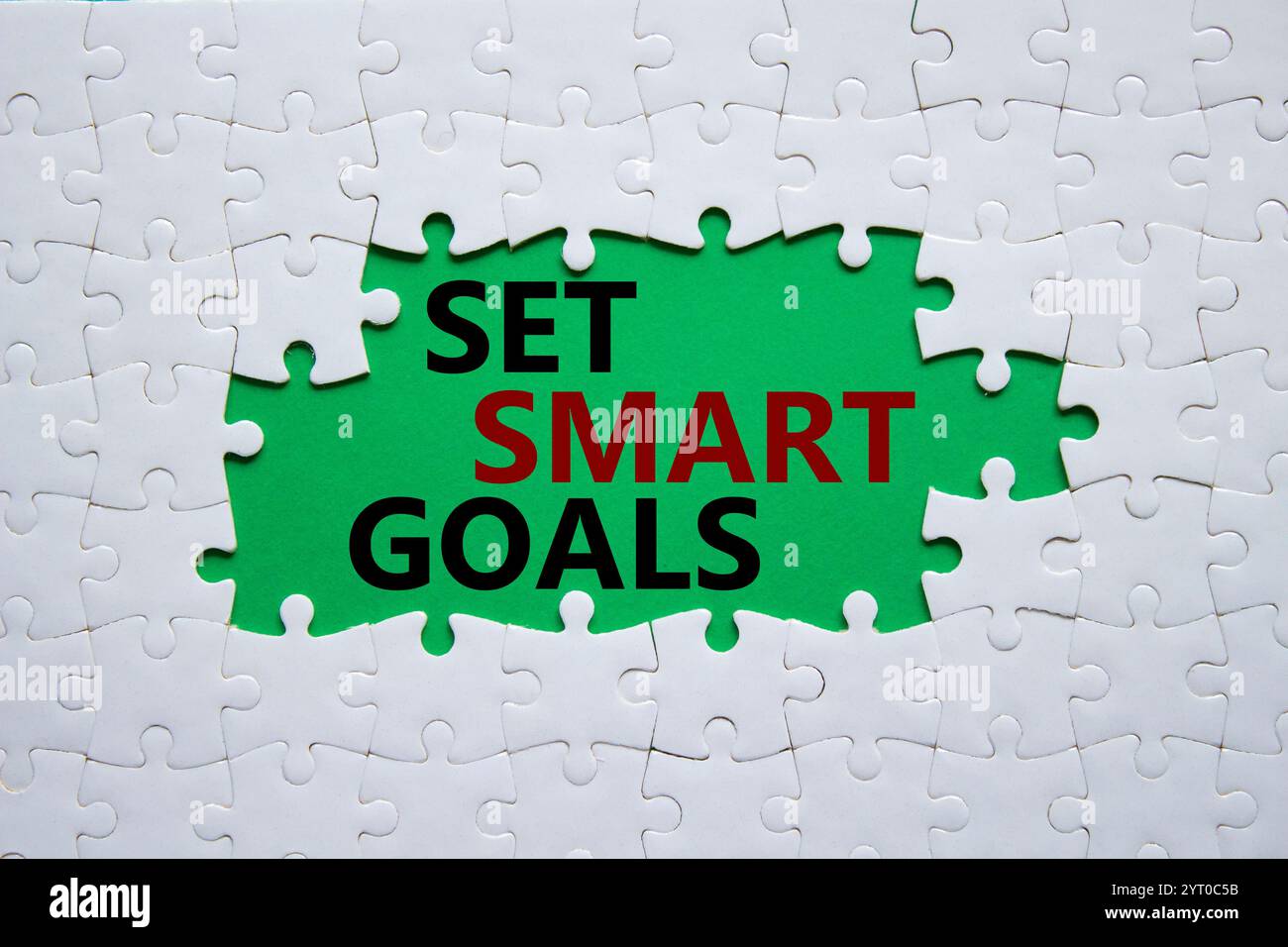 Set smart goals symbol. Concept words Set smart goals on white puzzle ...