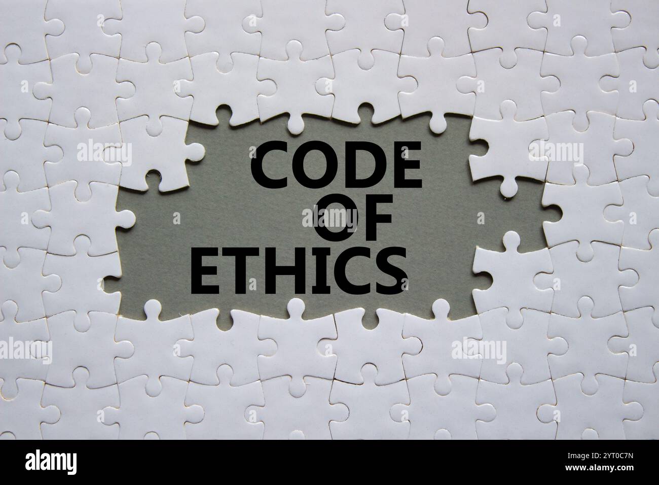 Code of ethics symbol. Concept words Code of ethics on white puzzle ...
