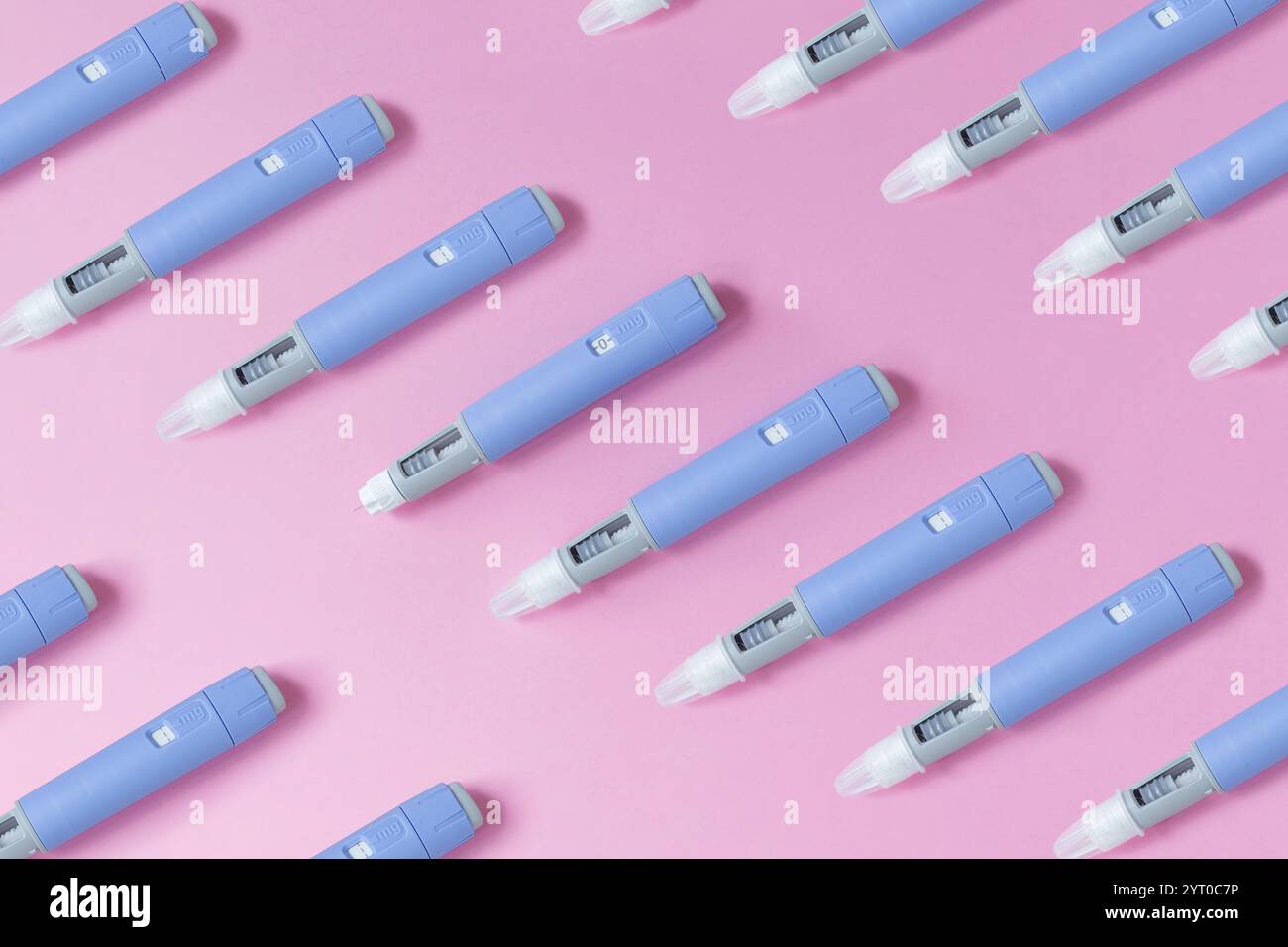 medical drug Ozempic injection lies on a pink background, top view ...