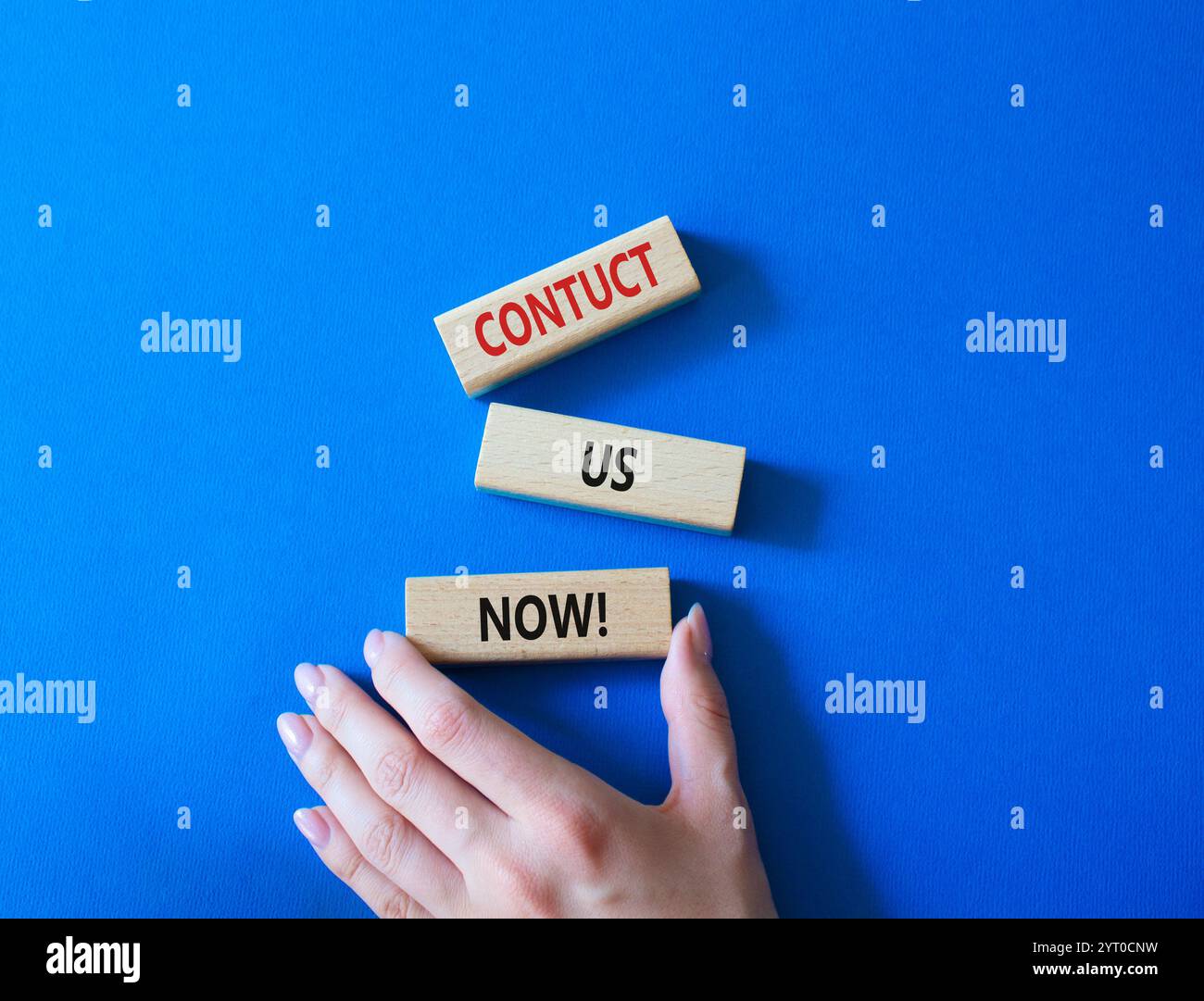 Contact us now symbol. Wooden blocks with words Contact us now ...