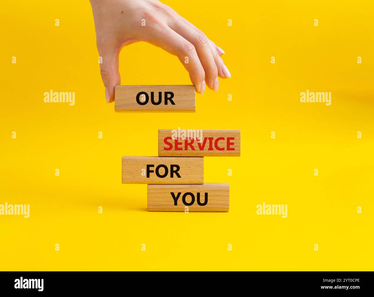 Our service for you symbol. Wooden blocks with words Our service for ...