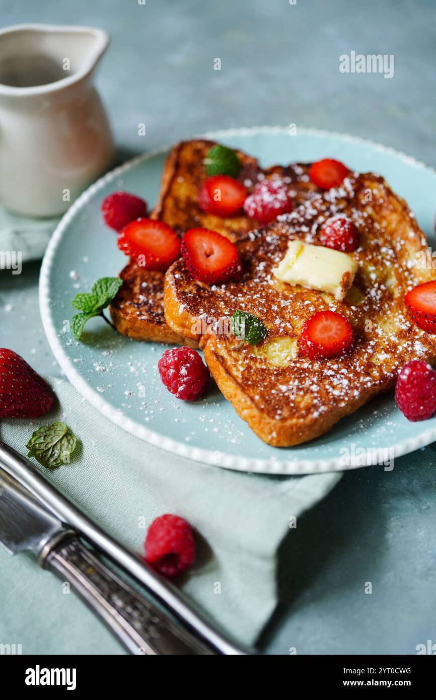 Homemade French toast with Brioche bread topped with berries Stock ...
