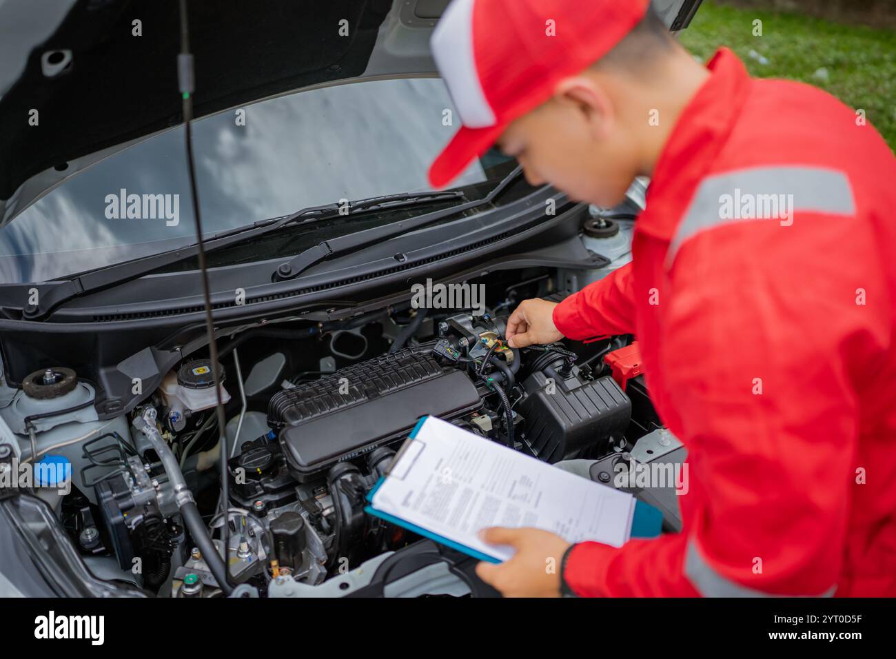 Automotive Technician Conducting Thorough Engine Maintenance and ...