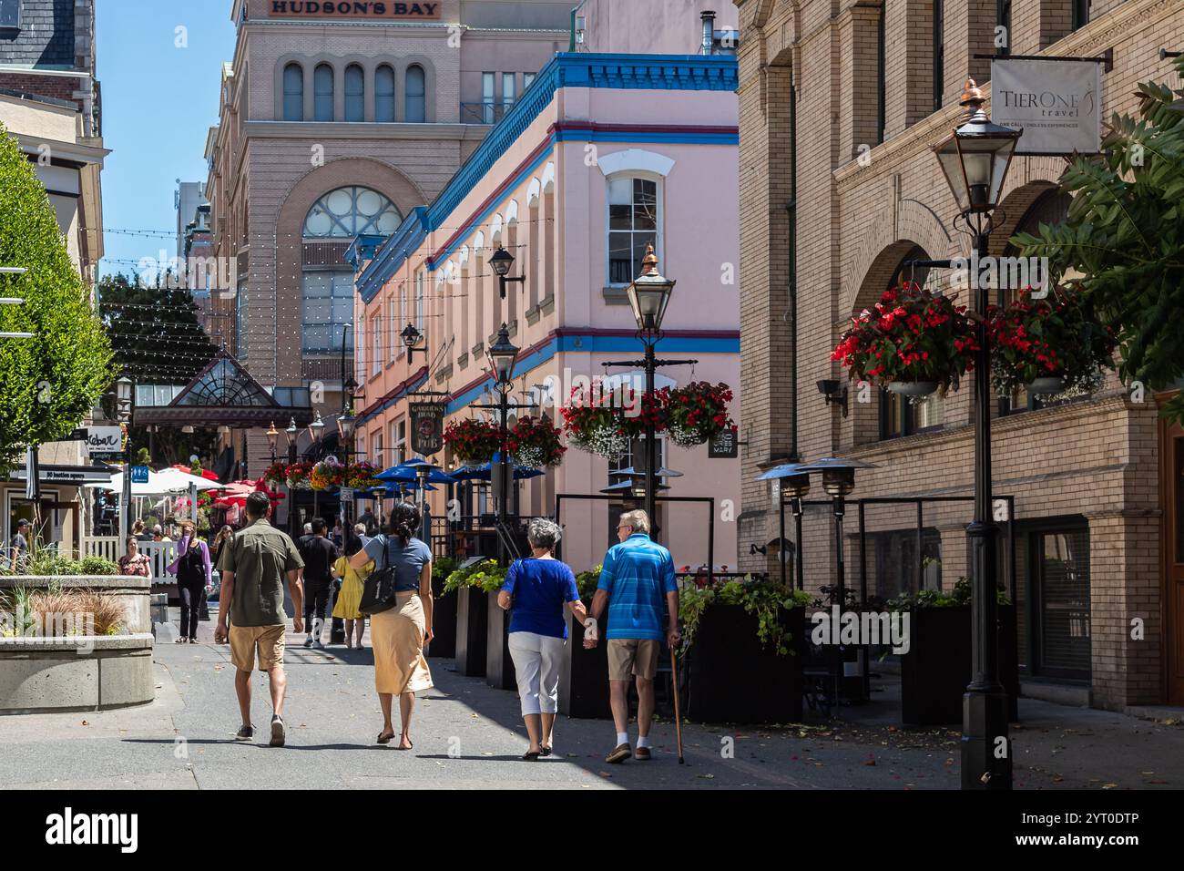 City view with historical architecture downtown Victoria. People ...