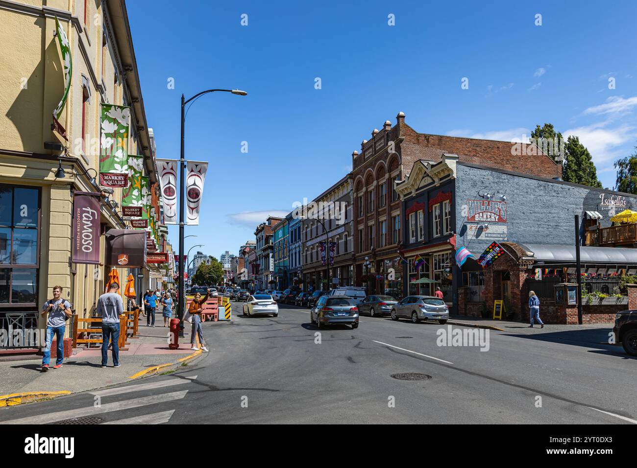 City view with historical architecture downtown Victoria. People ...