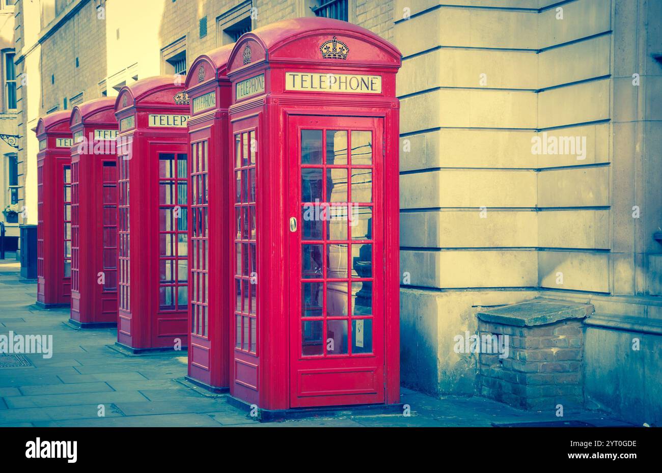Five traditional old style red phone boxes in London, England, UK ...