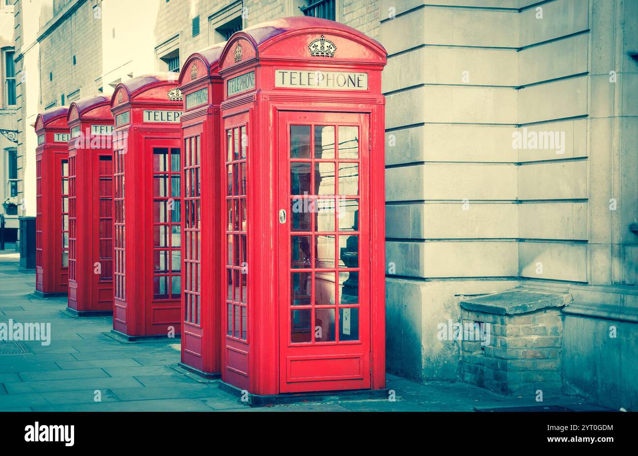 Five traditional old style red phone boxes in London, England, UK ...