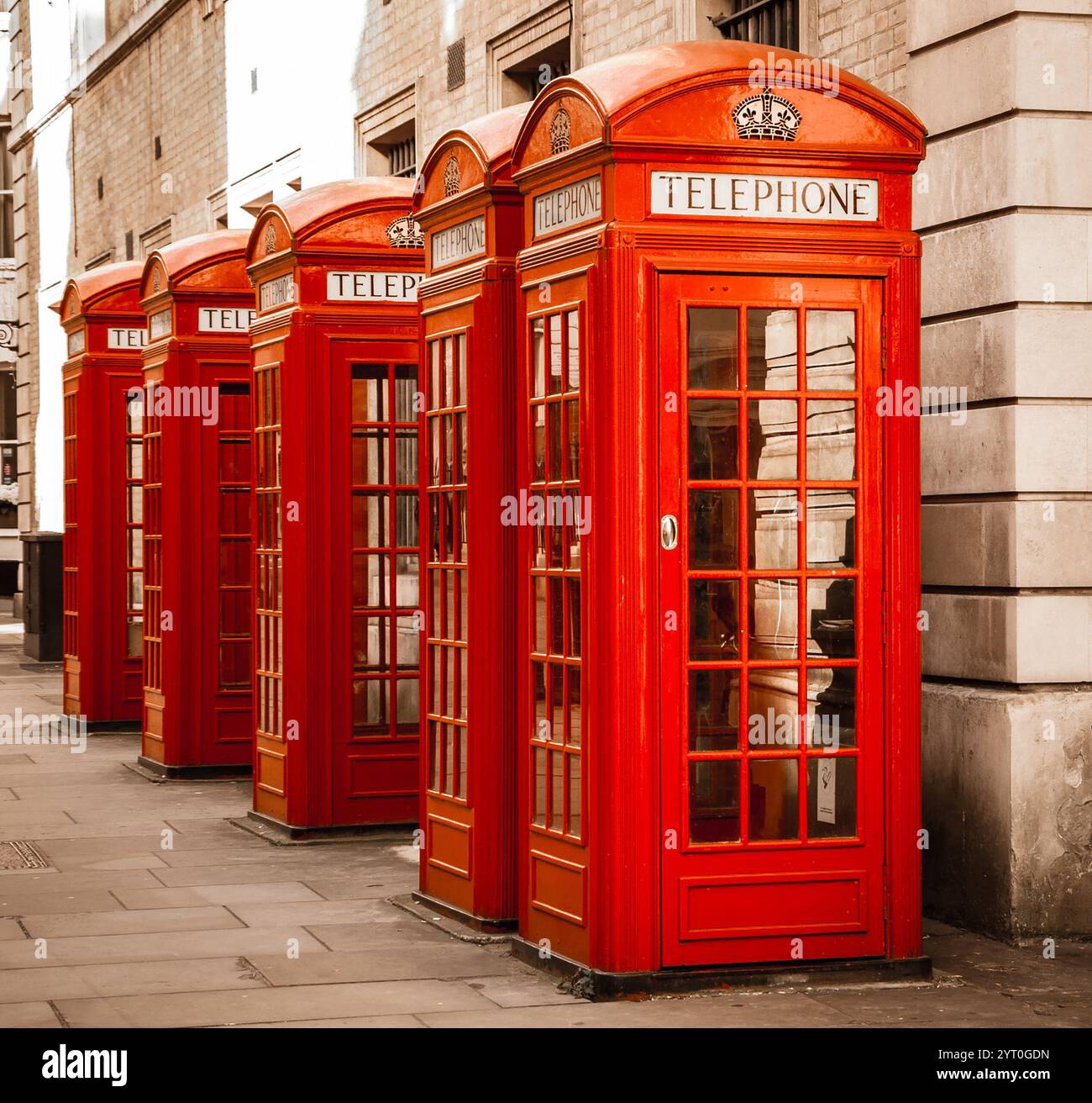 Five traditional old style red phone boxes in London, England, UK ...