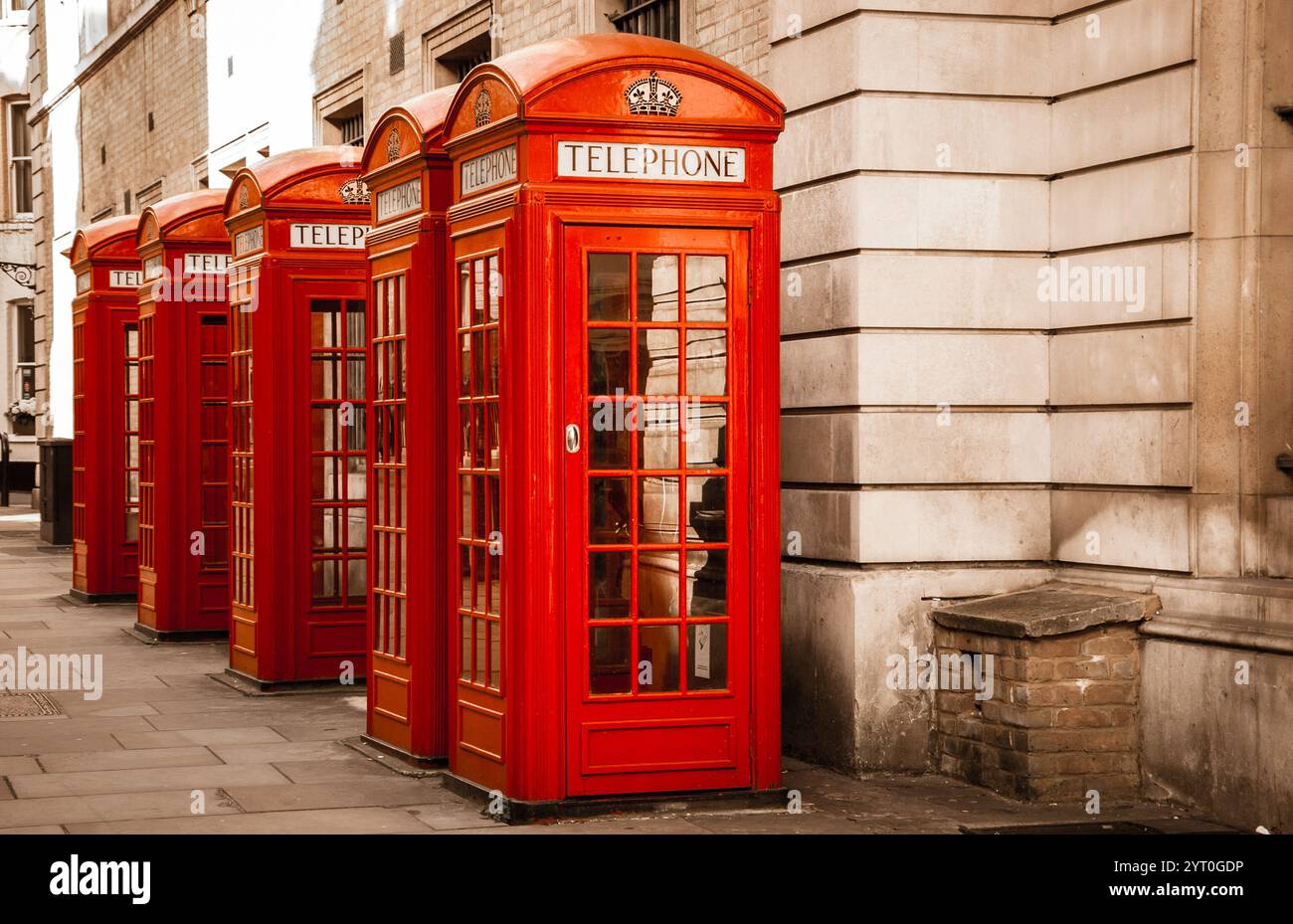Five traditional old style red phone boxes in London, England, UK ...