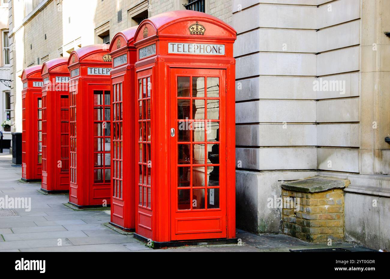 Five traditional old style red phone boxes in London, England, UK Stock ...