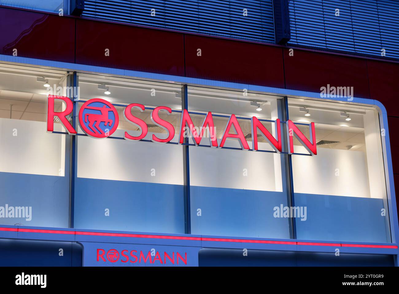 Cologne, Germany, December 04 2024: illuminated Rossmann advertising ...