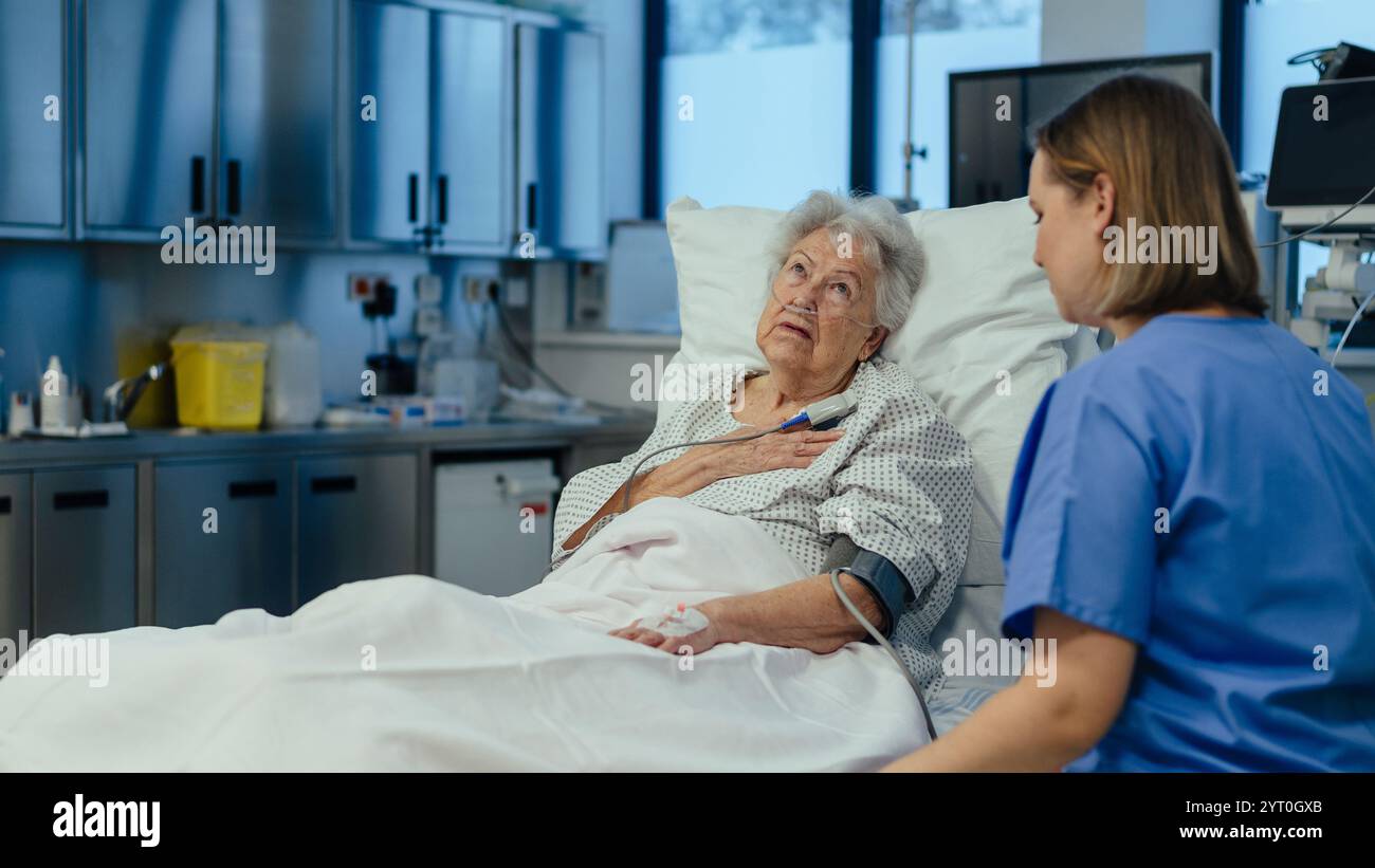 Old woman with serious health issues lying on hospital bed. Elderly ...