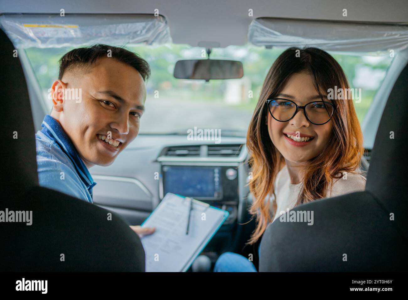 A Joyful Couple Enjoying a Fun Drive with Laughter and Engaging ...