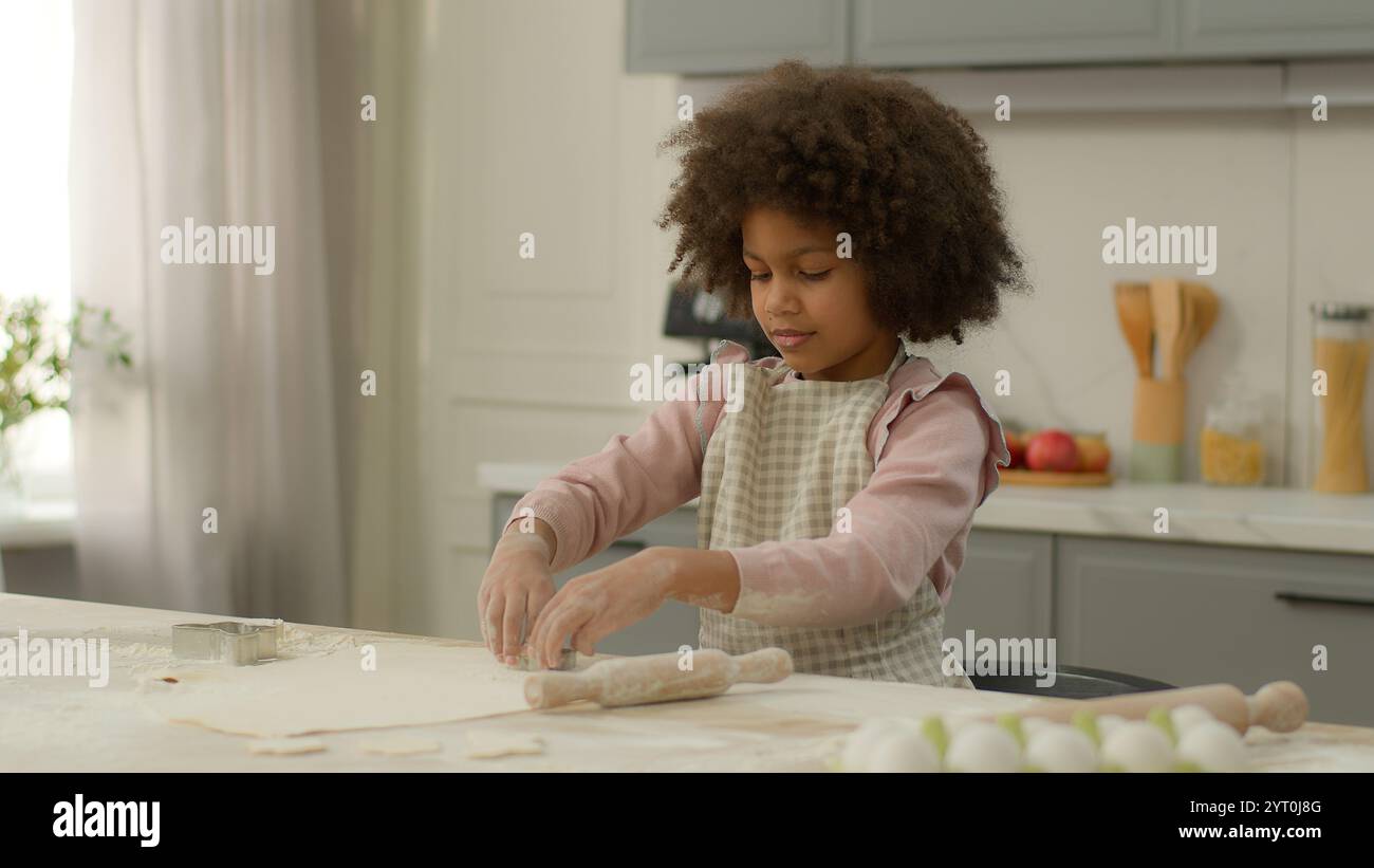 Little African American girl wear apron child kid ethnic daughter ...