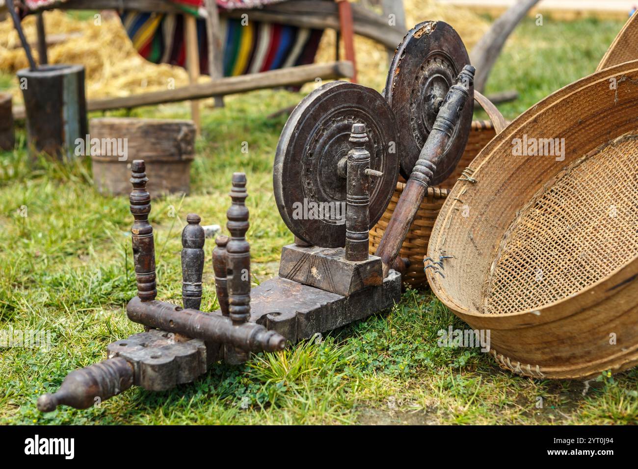 Wooden spinning wheel. Turkic distaff device for weaving wool. Istanbul ...