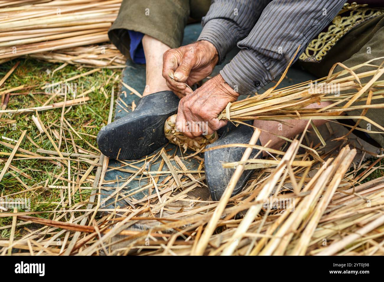 Craftsman making woven shoes out of straw. Istanbul - 11 May,2018 Stock ...