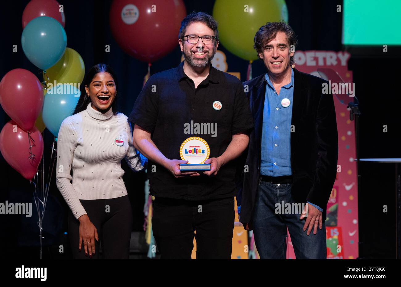 EDITORIAL USE ONLY Winner Jamie Smart (centre), joined by Shini ...