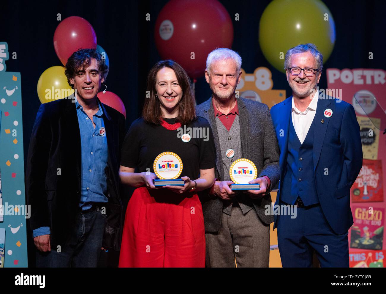 EDITORIAL USE ONLY Winners Clare Elsom and Dr John Bradshaw, joined by ...