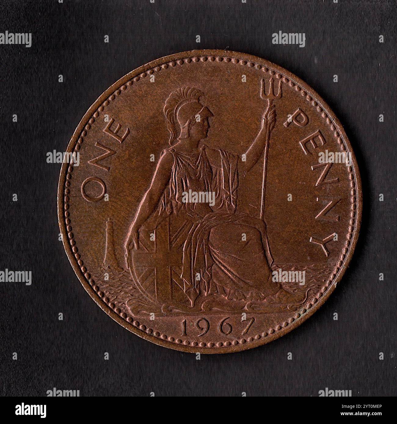 The back of a vintage Queen Elizabeth II penny from Great Britain on a ...