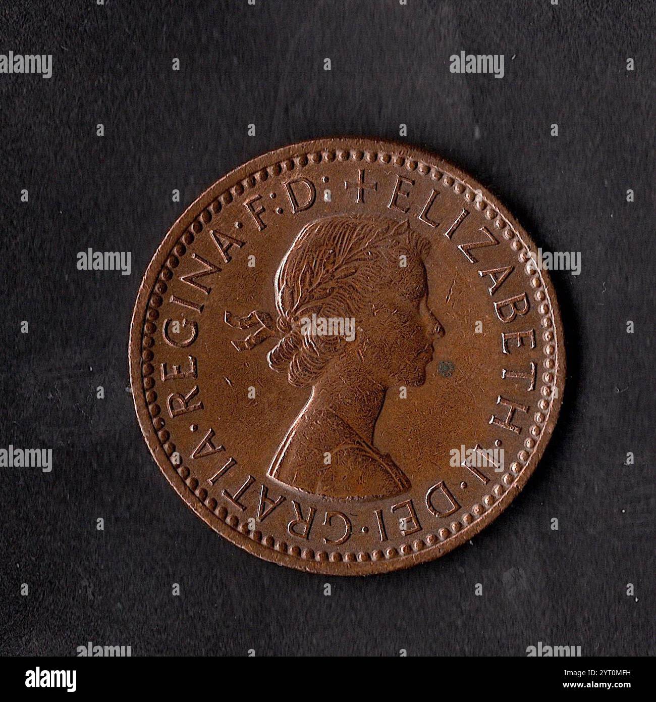 The front of a vintage Queen Elizabeth II farthing from Great Britain ...