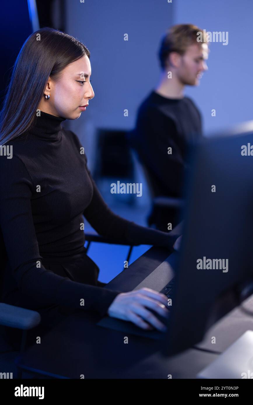 Busy and focused teamwork investigation in cyber security working to ...