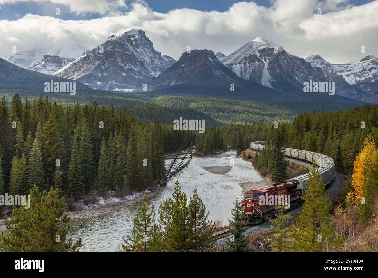 Canadian Pacific Railway train at Morant's Curve in Banff National Park, Alberta, Canada. Autumn ...