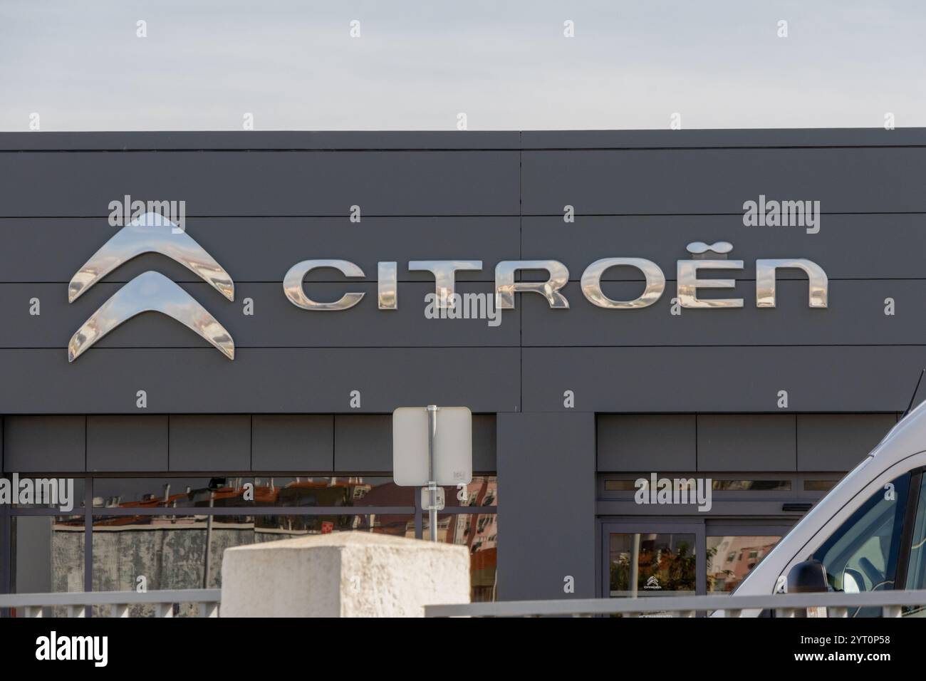 Citroen logo displayed on modern car dealership building, representing ...