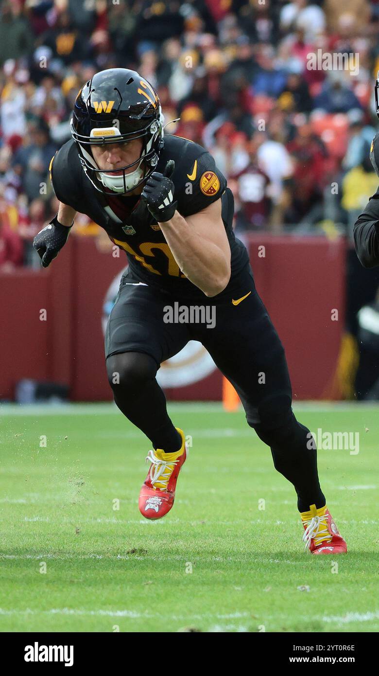 Washington Commanders wide receiver Luke McCaffrey (12) runs a route ...