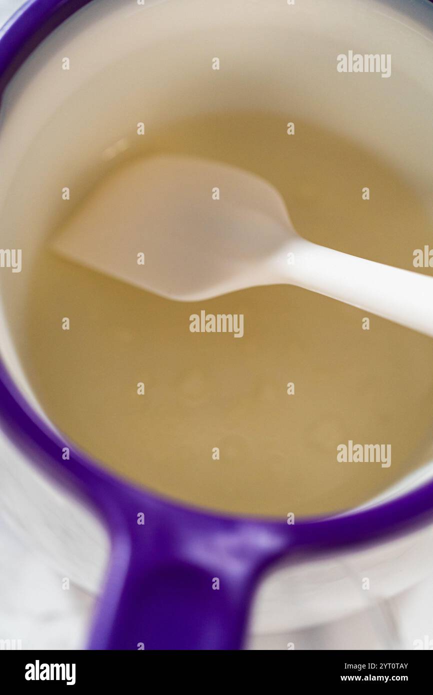 Melting Magic: Greasing Bundt Cake Pan for Baking Stock Photo - Alamy