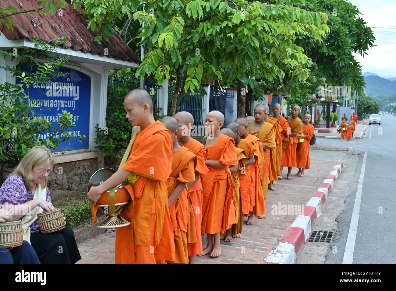Giving of alms Luangprabang Laos Stock Photo - Alamy
