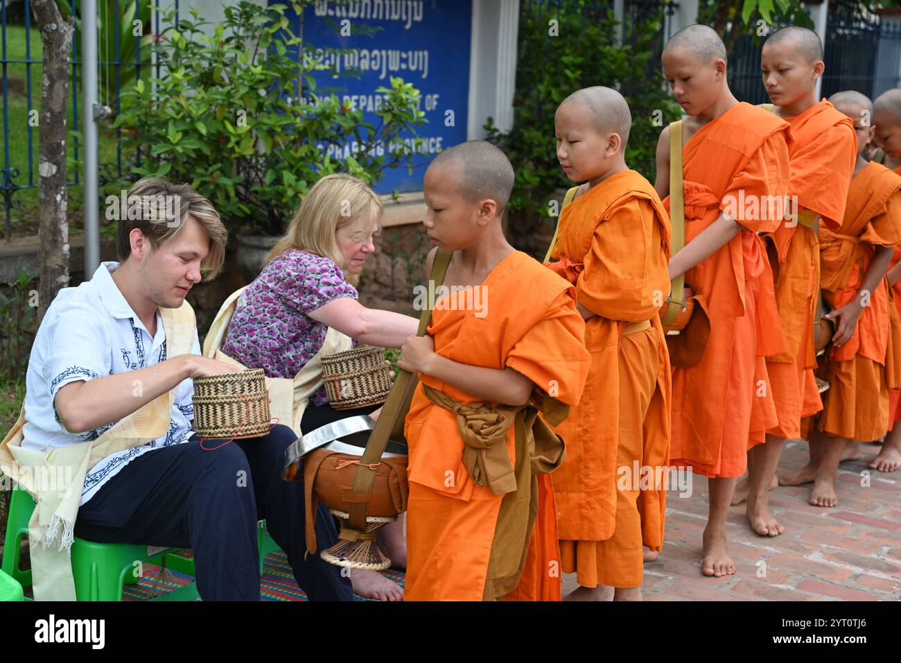 Giving of alms Luangprabang Laos Stock Photo - Alamy