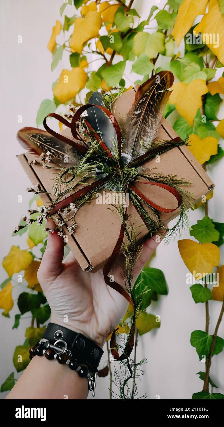 Craft packaging, package, box, parcel. Brown paper box decorated with ...