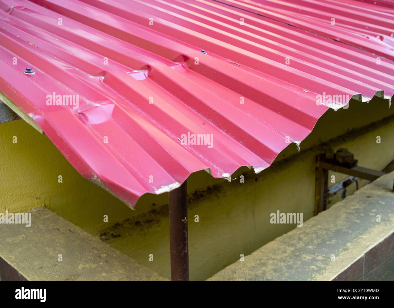 A dented roof of a canopy due to a heavy object falling on it Stock ...
