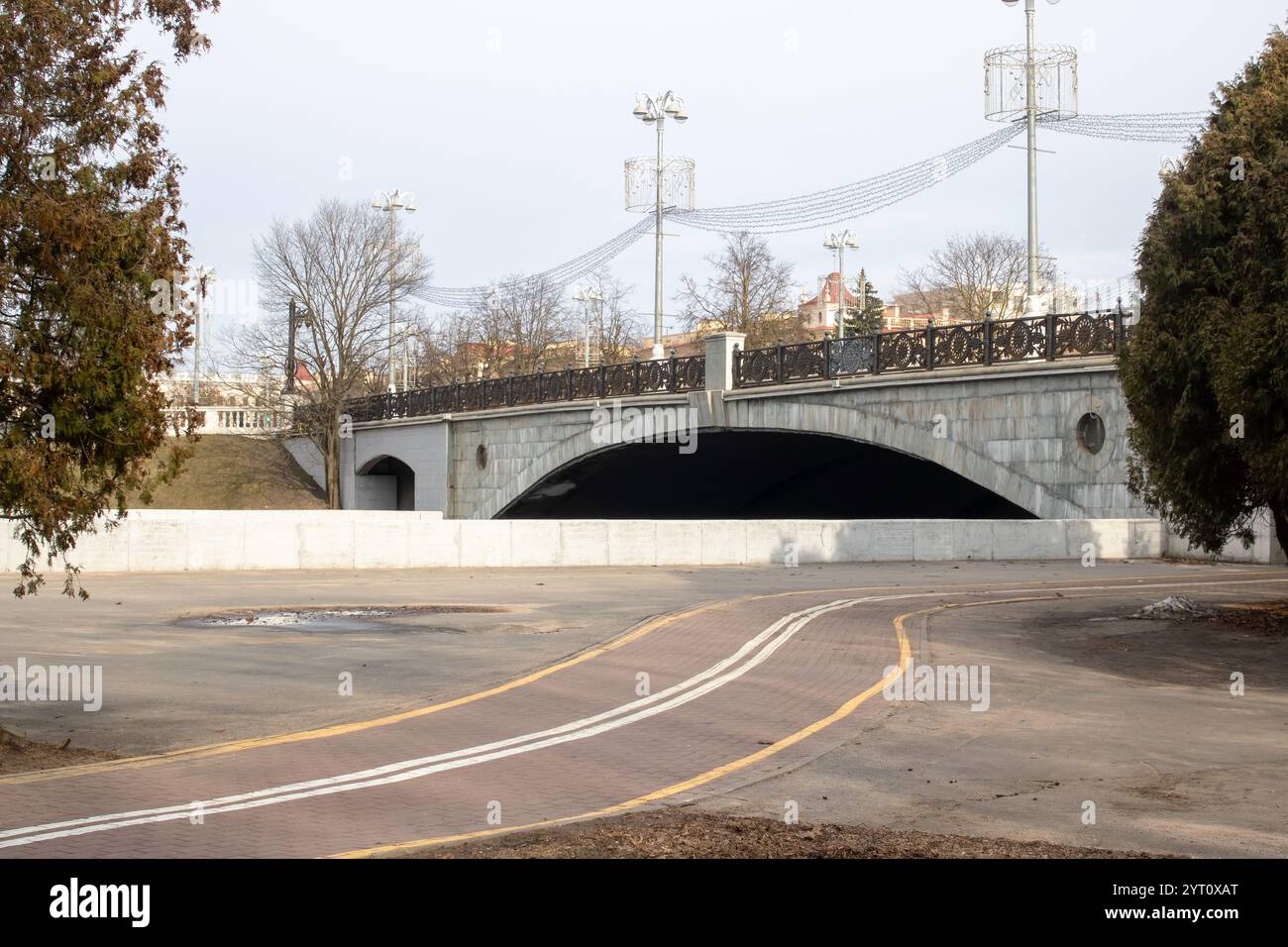 The scenery features a road that stretches forward, complemented by a ...